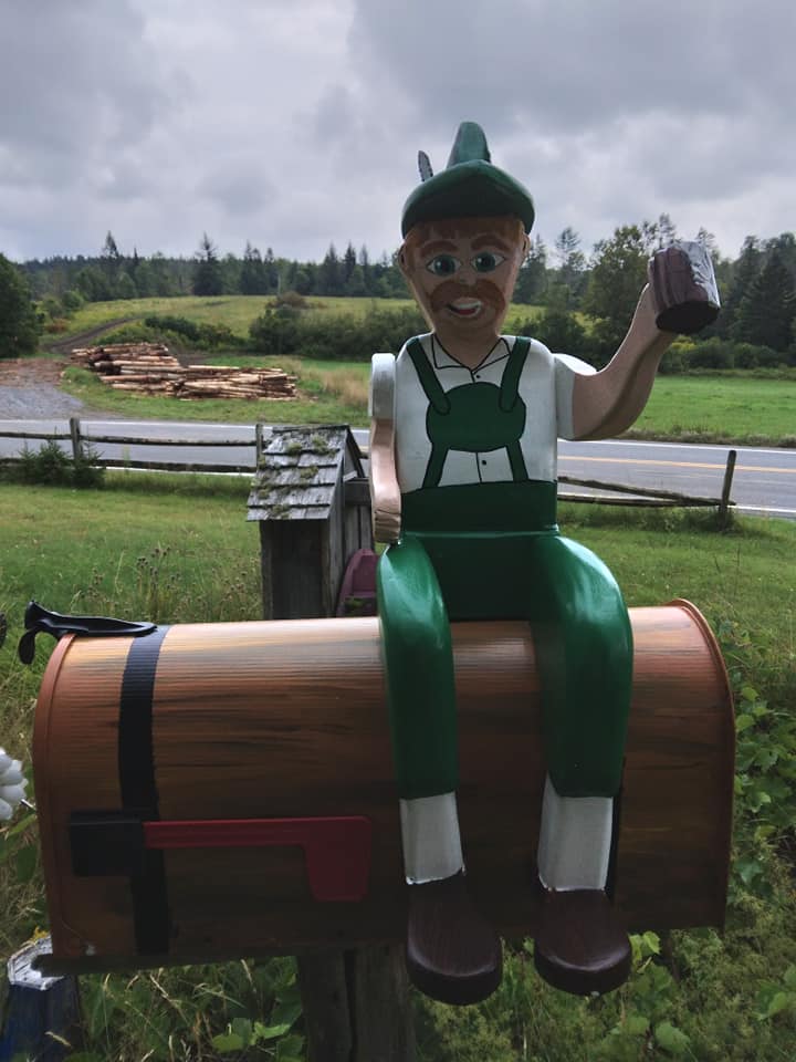 Man sitting on barrel mailbox, custom mailbox, cartoon mailbox ...